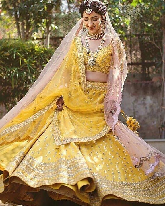 28 Eye Catching Golden Bridal Lehenga Designs Ideas for this Wedding
