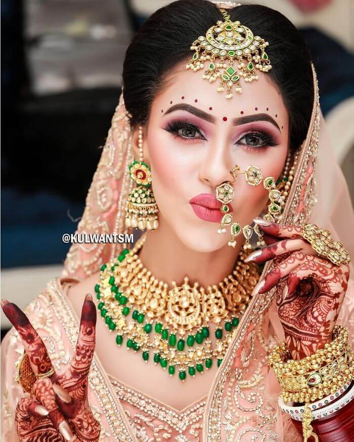 20 Regal Bridal Nose Ring Designs for a Royal Ensemble