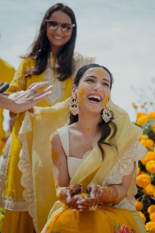21+ Latest Instagram-worthy Haldi Poses for Brides and Couples